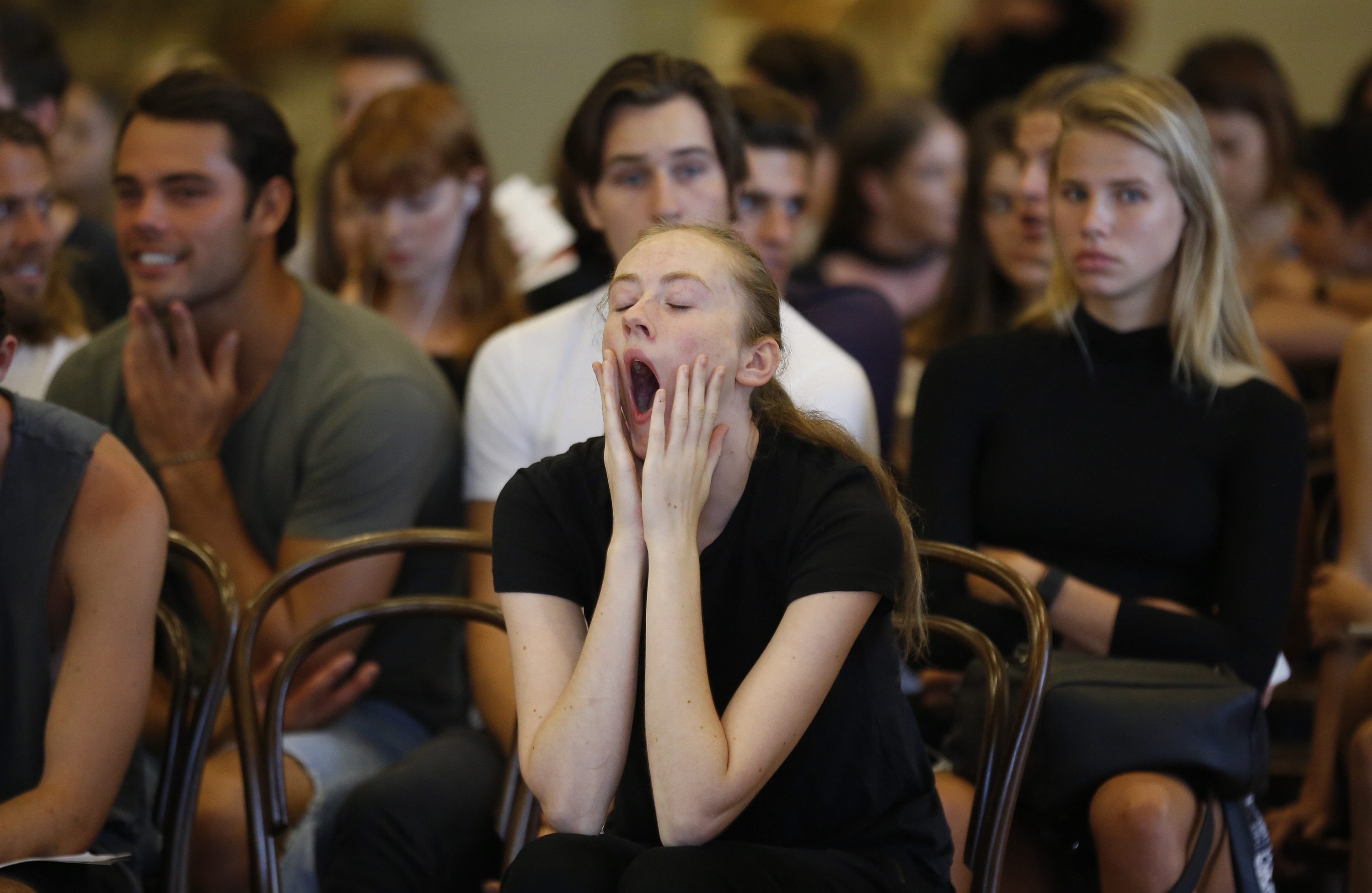 Group Of People Yawning