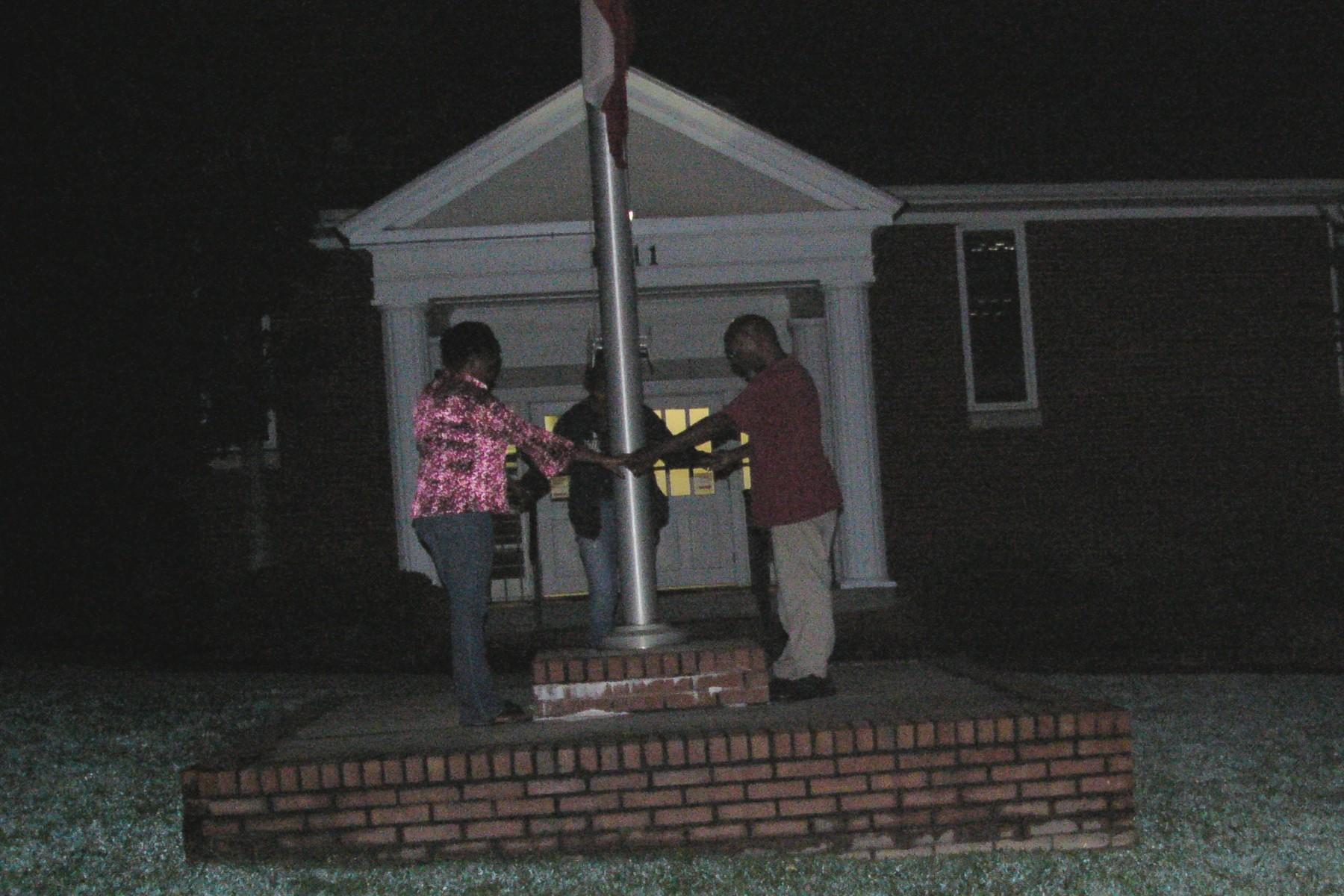 Perry church prays around city flag poles | 13wmaz.com
